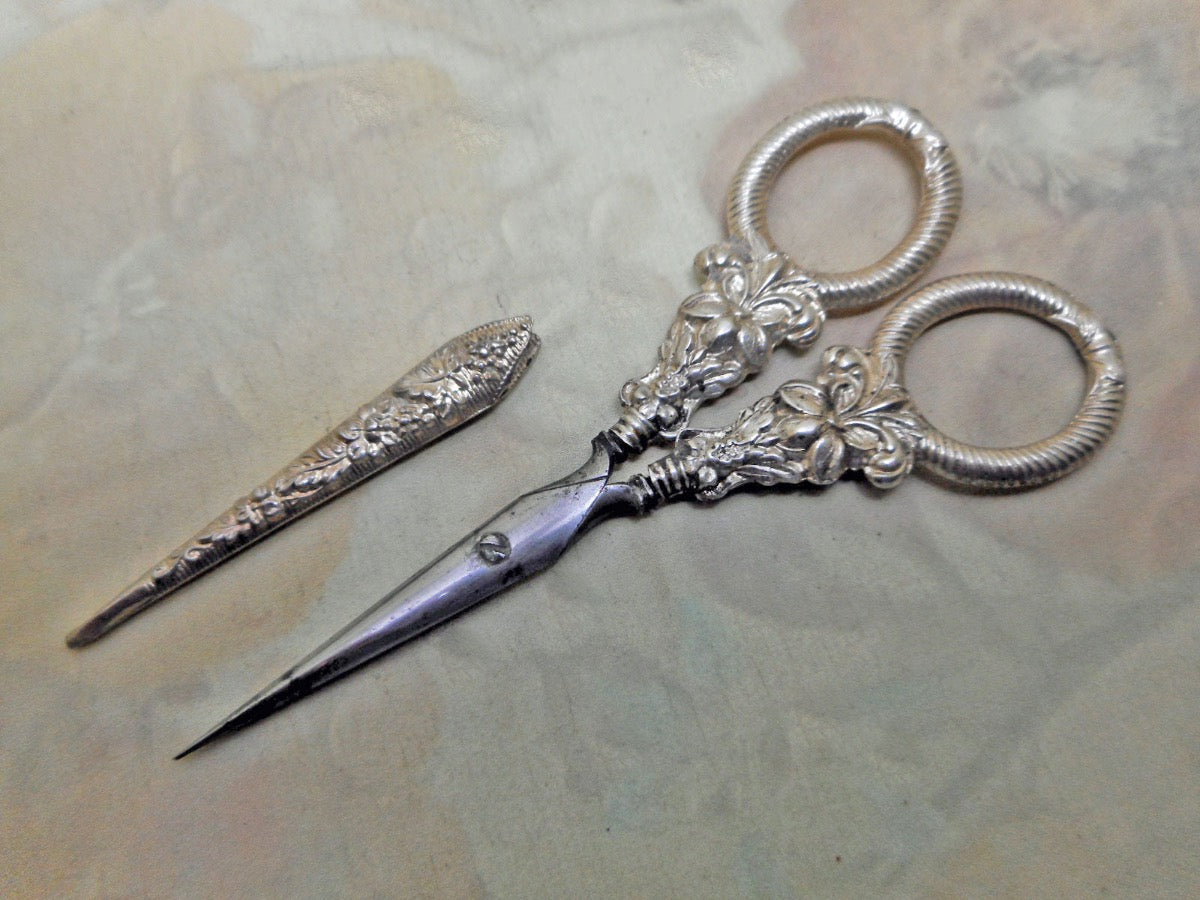 SOLD.....A fine pair of silver handled scissors with blade sheath. c18 ...