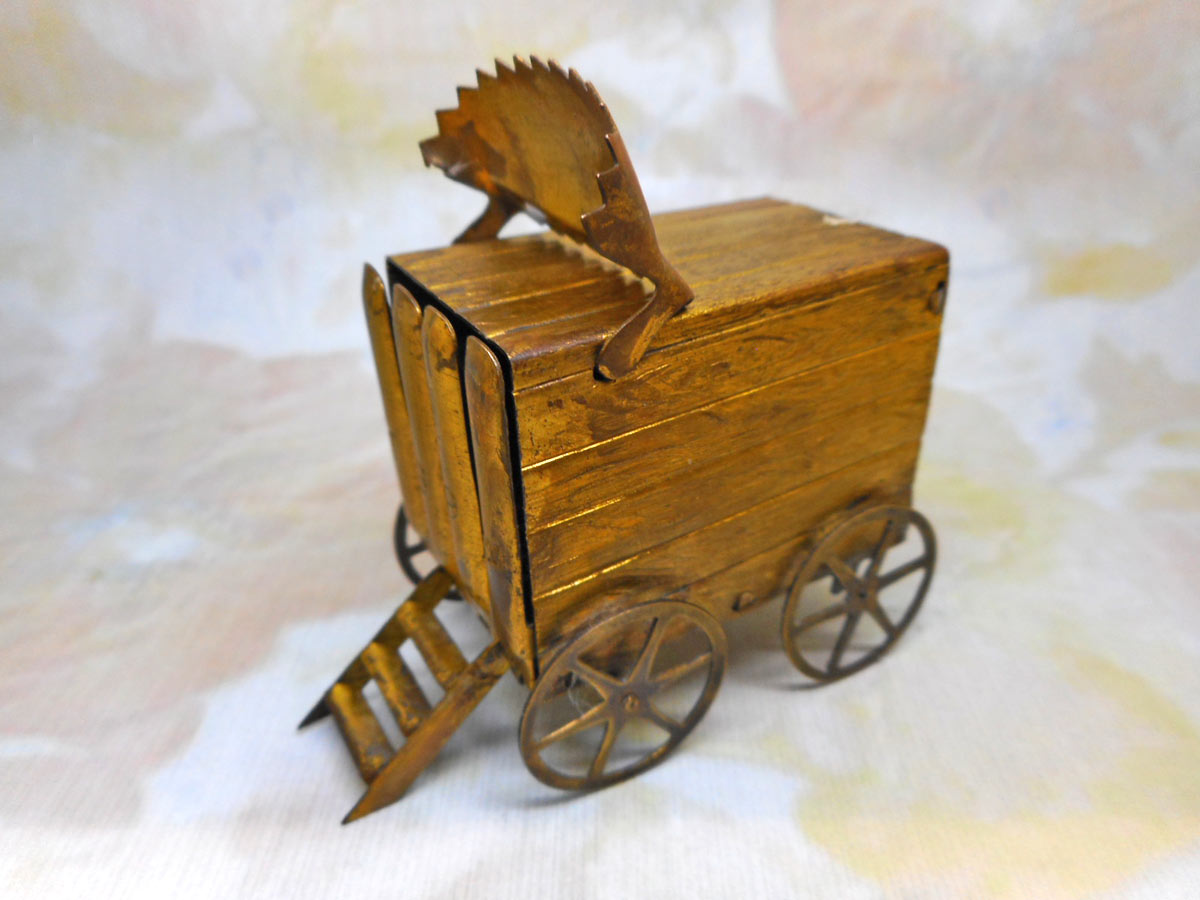 A novelty brass Bathing Machine needle case. Reg. yr. 1879. Avery type ...