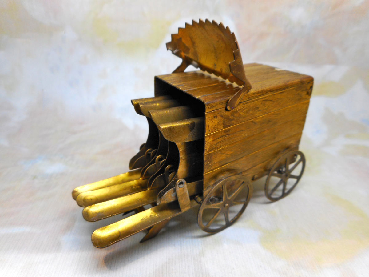 A novelty brass Bathing Machine needle case. Reg. yr. 1879. Avery type ...