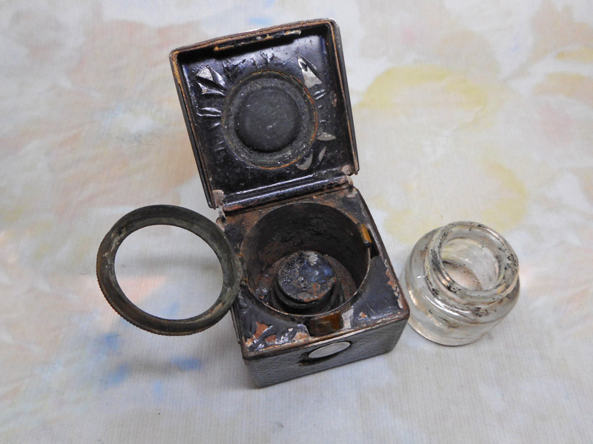A silver mounted leather inkwell from a dressing box. London 1864 JV J ...