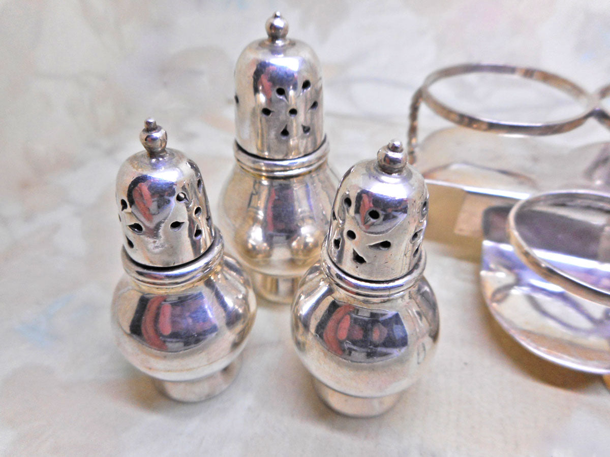 A miniature sterling silver cruet made to an 18th century design ...